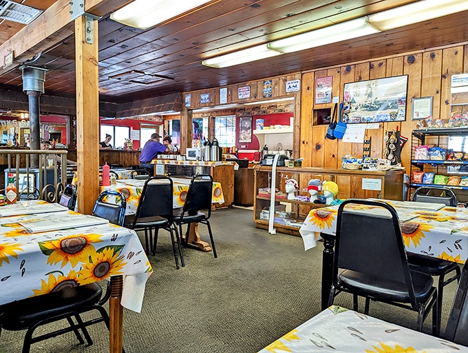 Sunflower tablecloths brighten the wood-paneled dining room, creating that perfect balance of mountain charm and "your favorite aunt's kitchen" comfort.