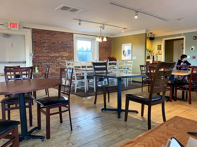 Exposed brick walls and mismatched chairs create that rare atmosphere where both your grandmother and your hipster nephew would feel equally at home.