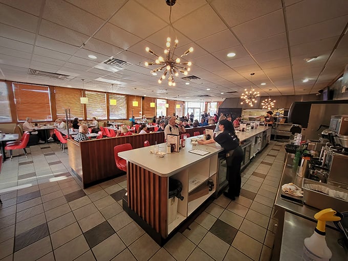 Where starburst chandeliers meet checkered floors and red booths&mdash;diner design perfection that says "stay awhile, the coffee's always hot."