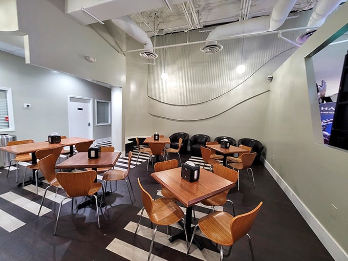 Modern meets nostalgic in this clean, inviting space where wooden tables invite you to linger longer than you planned.