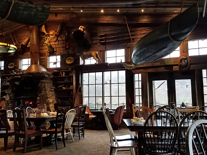 Suspended boats and mounted wildlife transform dining into an adventure. This isn't d&eacute;cor&mdash;it's a genuine Ozark fishing lodge that happens to serve incredible food.