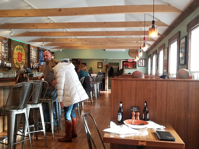 Inside, wooden beams and warm lighting create that perfect "where everybody knows your name" vibe&mdash;minus Norm, plus spectacular mac and cheese.
