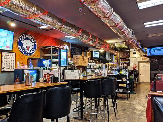 Exposed ductwork wrapped in festive decorations and local sports memorabilia create that perfect "come as you are" diner atmosphere where comfort trumps pretension.