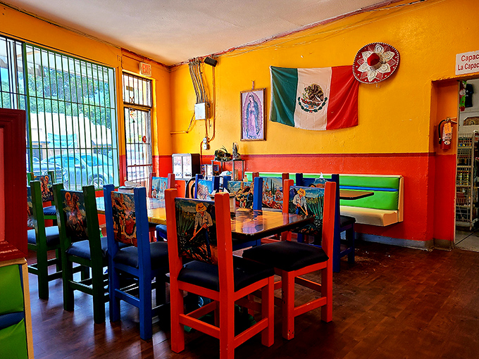 Vibrant colors explode inside like a Mexican fiesta in furniture form. Those chairs aren't just seating—they're a declaration that boring beige has no place here.