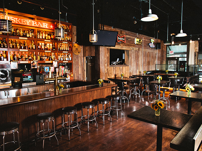 Step inside and you're transported to whiskey wonderland. The warm wooden interior says "stay awhile" while the bar beckons "have another."