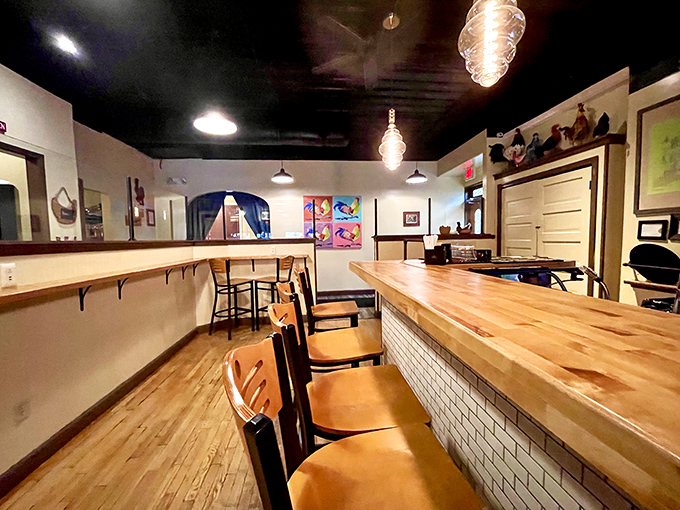 Warm wooden accents and stylish lighting create the perfect backdrop for culinary magic. Like a cozy hug with excellent taste.