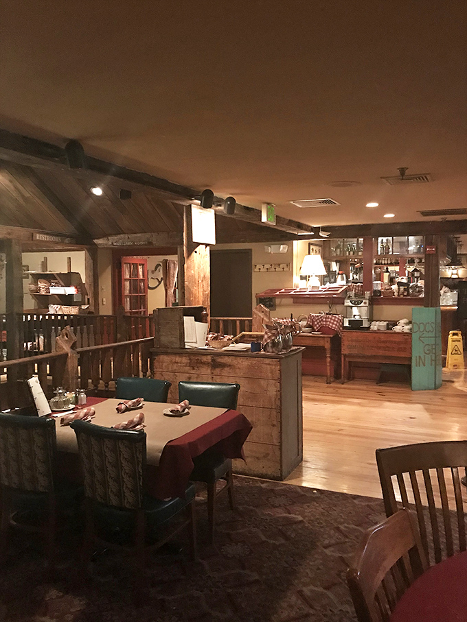 Rustic wooden beams and warm lighting create the perfect backdrop for comfort food conversations. It's like dining in a Norman Rockwell painting that serves incredible mac and cheese.