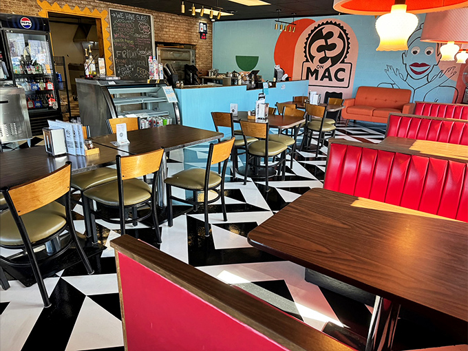 Retro meets modern with checkered floors and vibrant red booths. This isn't just dining&mdash;it's time travel with better food.