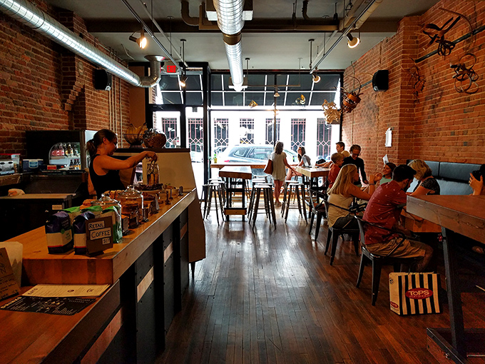 Exposed brick walls and warm wooden floors create the perfect backdrop for culinary magic, like stepping into your coolest friend's downtown loft.