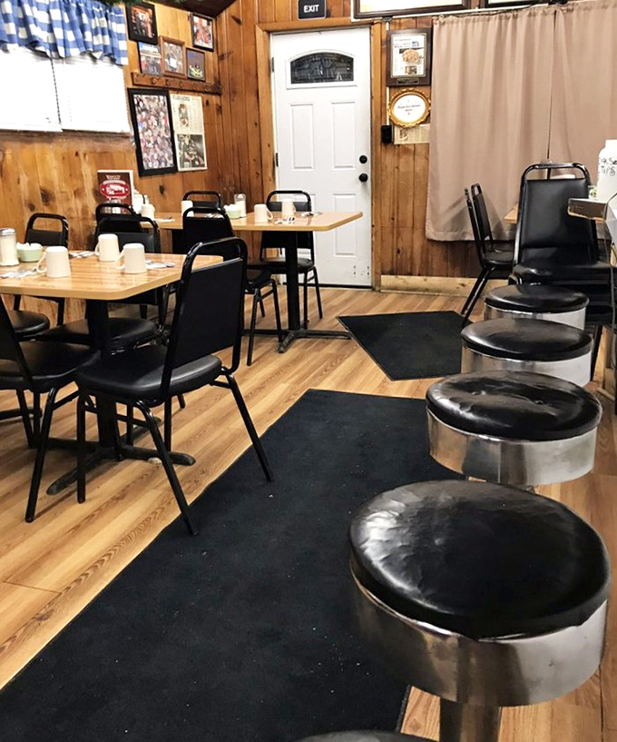 Where wood paneling meets breakfast magic. The cozy interior feels like stepping into your favorite aunt's kitchen&mdash;if she could flip pancakes the size of hubcaps.