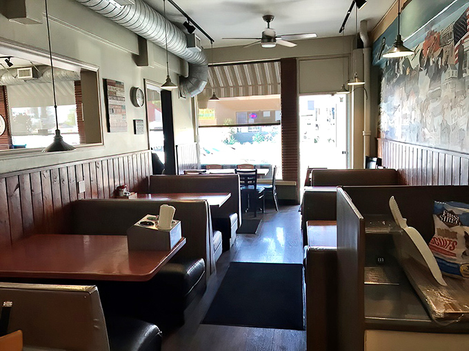 Classic red booths and checkered floors create the perfect backdrop for serious breakfast conversations. 