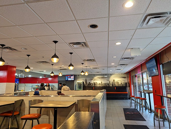 No-frills interior with a purpose: minimal distractions from the main event. The red accents remind you what you're here for&mdash;chicken worth waiting for.