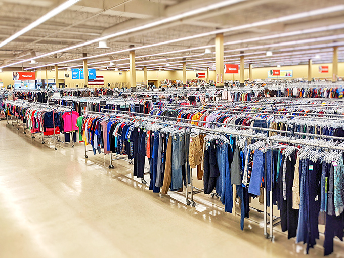Ocean-like waves of clothing racks stretch to the horizon, each garment waiting to tell its story to a new owner.