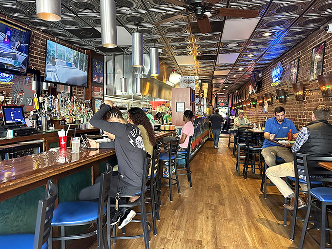 Inside, exposed brick meets ornate tin ceilings while patrons belly up to a bar that's seen countless toasts and nacho-induced food comas.