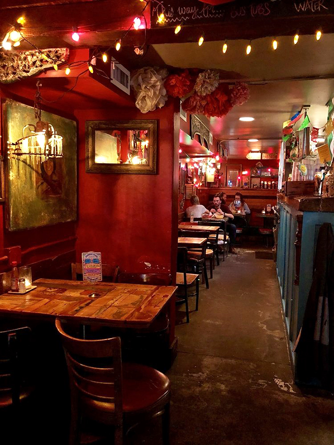 Step inside and the warm red walls embrace you like a culinary hug, with string lights creating that "tonight's going to be special" ambiance.