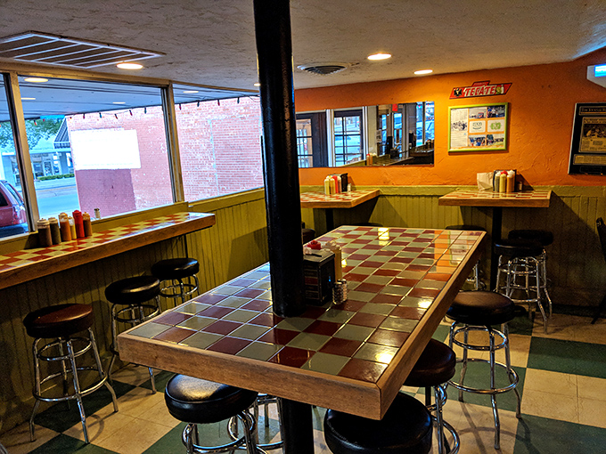 Colorful tile-topped tables and retro bar stools create the perfect casual vibe for serious taco business.