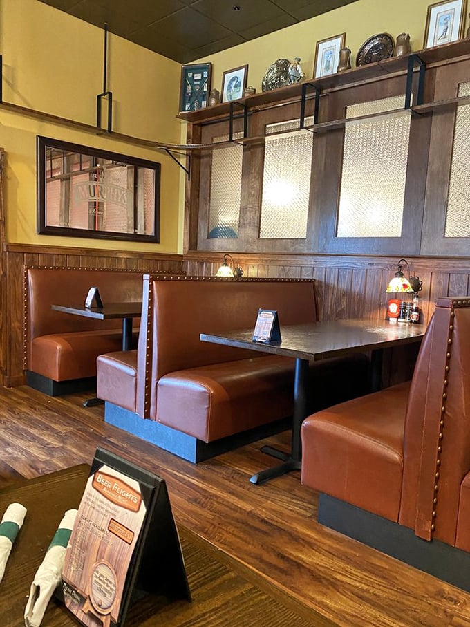 Cozy leather booths invite lingering conversations. The warm wood paneling and soft lighting transport you across the Atlantic, no passport required.