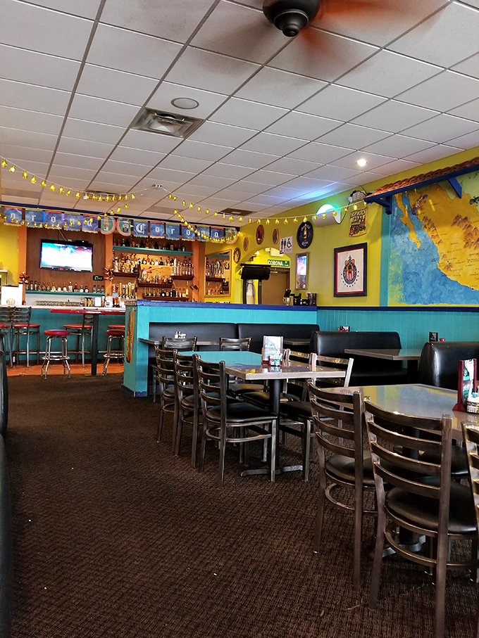 Step inside and the fiesta begins! Vibrant colors, Mexican artwork, and that turquoise-yellow combo that instantly signals authentic flavors await.