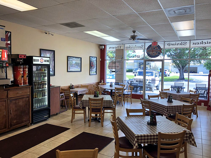 Simple wooden tables, checkered tablecloths, and zero pretension. This dining room isn't trying to impress you with d&eacute;cor&mdash;it's saving all that energy for your taste buds.