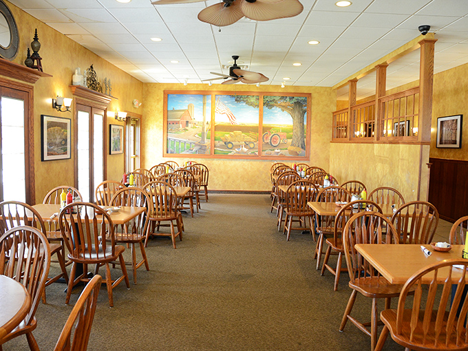 Warm yellow walls, wooden Windsor chairs, and a rural mural create that "grandma's dining room" vibe where calories simply don't count.