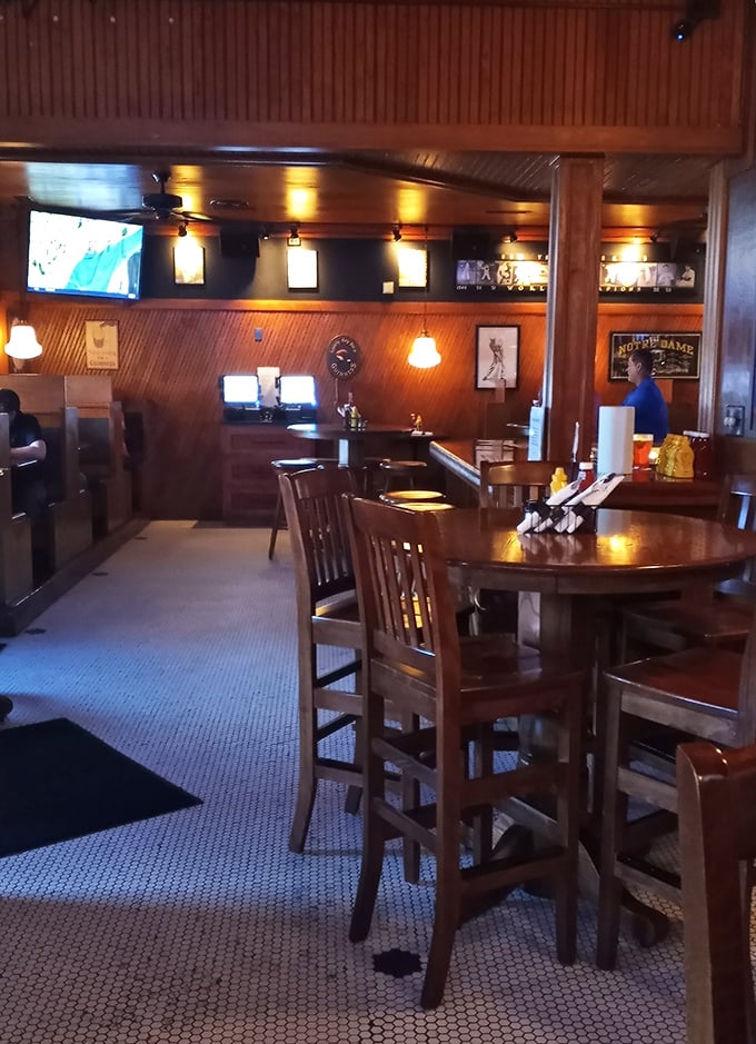 Warm wood paneling and Notre Dame memorabilia create that perfect "everybody knows your name" vibe. The kind of place where comfort arrives before your food does.