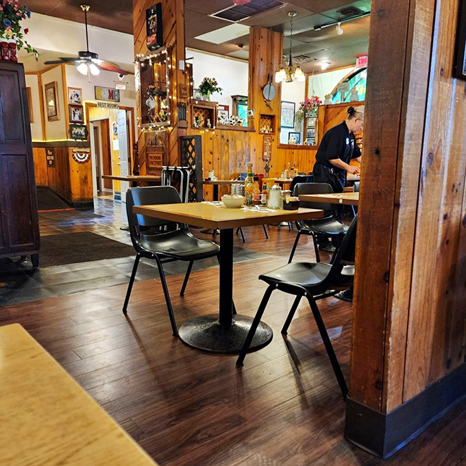Warm wood paneling and cozy booths create that perfect "neighborhood joint" atmosphere where coffee refills flow as freely as local gossip.