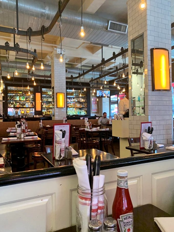 Industrial-chic meets comfort in this cleverly designed space. Those pendant lights create the perfect ambiance for serious burger contemplation.