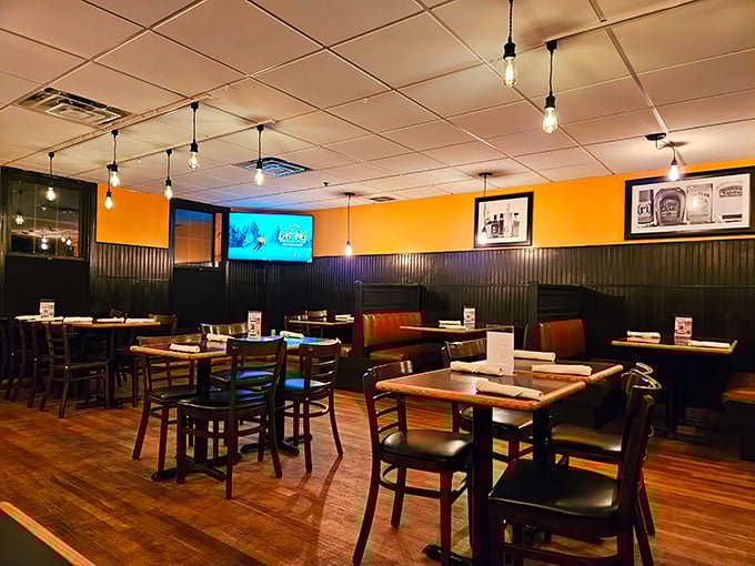 Inside, Edison bulbs cast a warm glow over wood-paneled walls, creating that perfect "I could stay here all afternoon" vibe.