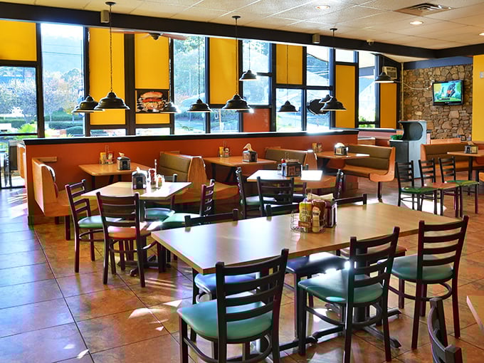 Sunshine streams through yellow-framed windows, creating the perfect lighting for both your meal and your inevitable food photos.