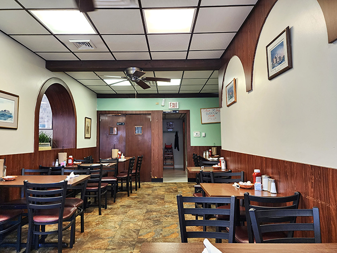 Step inside and you're transported to a simpler time&mdash;wood paneling, mint-green walls, and ceiling fans that have witnessed countless morning conversations and coffee refills. 