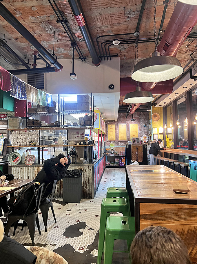 Industrial-chic meets taqueria warmth inside El Jefe's, where exposed brick and ductwork create the perfect backdrop for culinary magic.