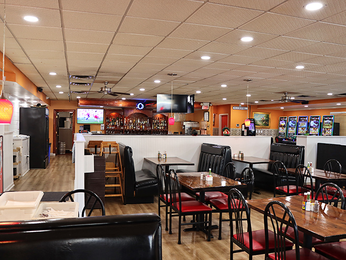 Step inside to a warm embrace of orange walls, wooden tables, and the promise of margaritas that will make Monday feel like Friday.