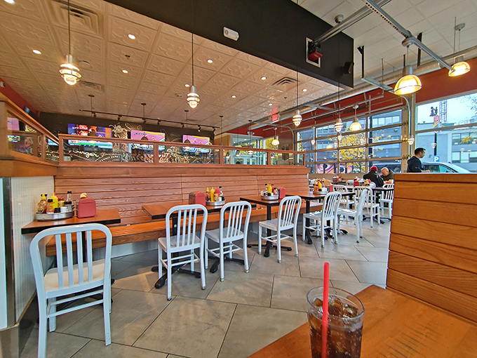 Simplicity reigns supreme with wooden counters and those iconic metal chairs that say, "We're serious about food, not furniture." The perfect stage for culinary magic.