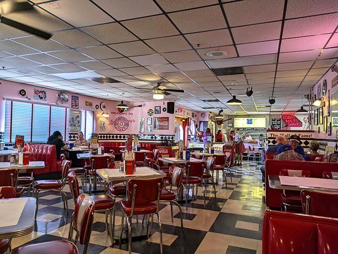 Step inside and suddenly calories don't count. The checkerboard floor and candy-apple red booths transport you to an era when Elvis was king.