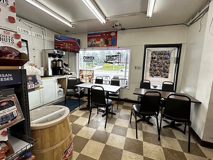 Inside, the classic checkered floor and no-nonsense seating tell you everything: this place prioritizes sandwich perfection over interior design trends.