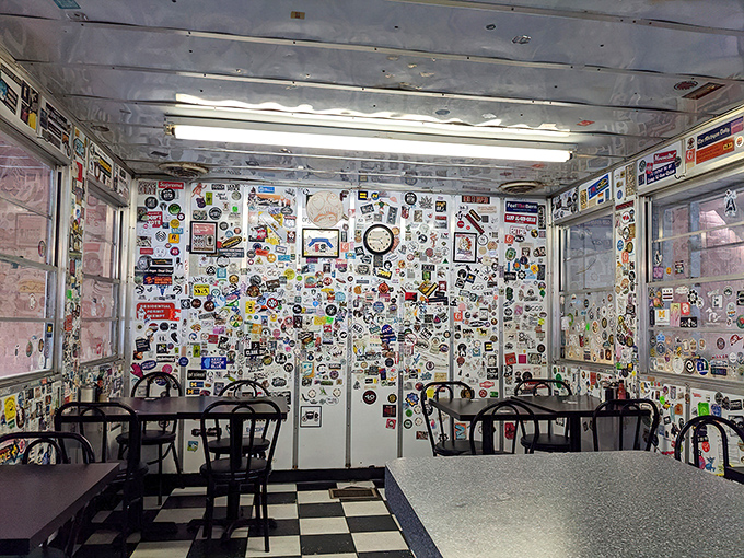 Sticker-covered walls tell thousands of stories from decades of diners. This isn't decoration&mdash;it's a living archive of human connection over comfort food.