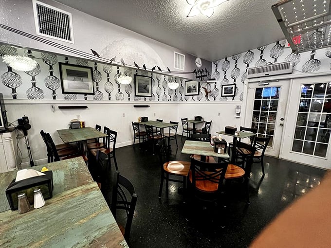 Inside, black and white patterned wallpaper creates a whimsical backdrop for serious fry consumption. The rustic tables have hosted countless happy diners before you.
