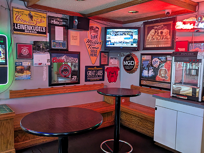 Beer signs and sports memorabilia create the perfect dive bar atmosphere &ndash; where calories don't count and napkins are considered essential survival gear.