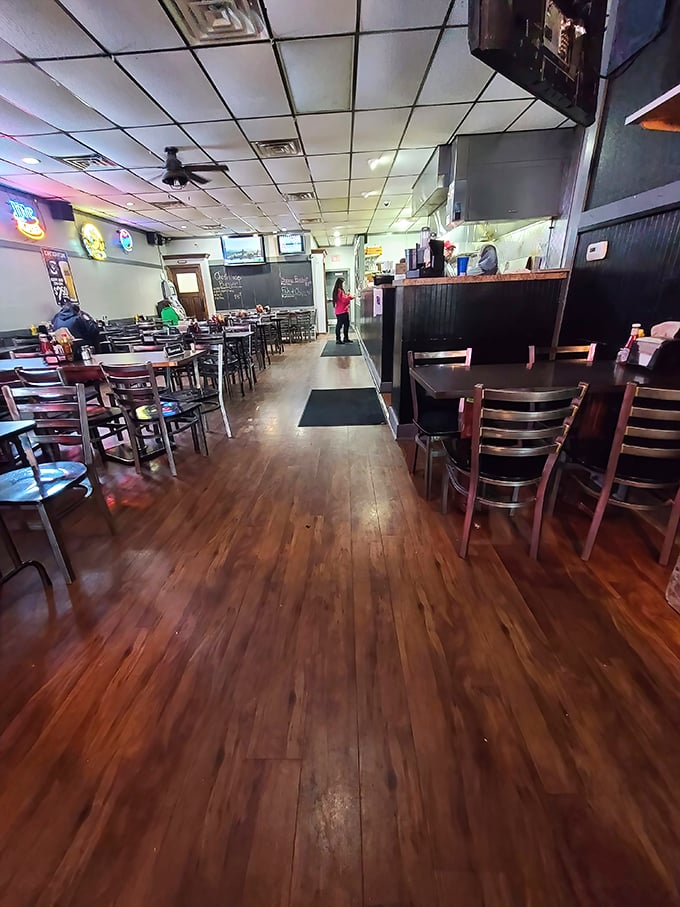 Simple wooden floors, no-nonsense tables, and the promise of burger perfection. Dinker's interior says, "We're here for the food, not the frills."