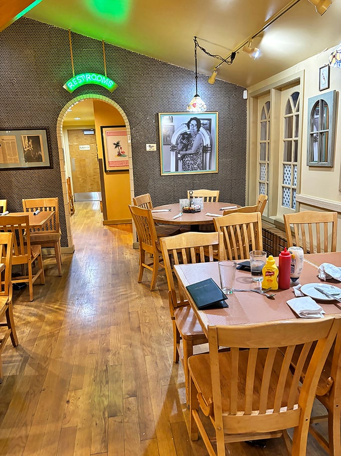Step inside and you're transported to a simpler time, where wooden floors creak with stories and vintage photos watch over your meal.