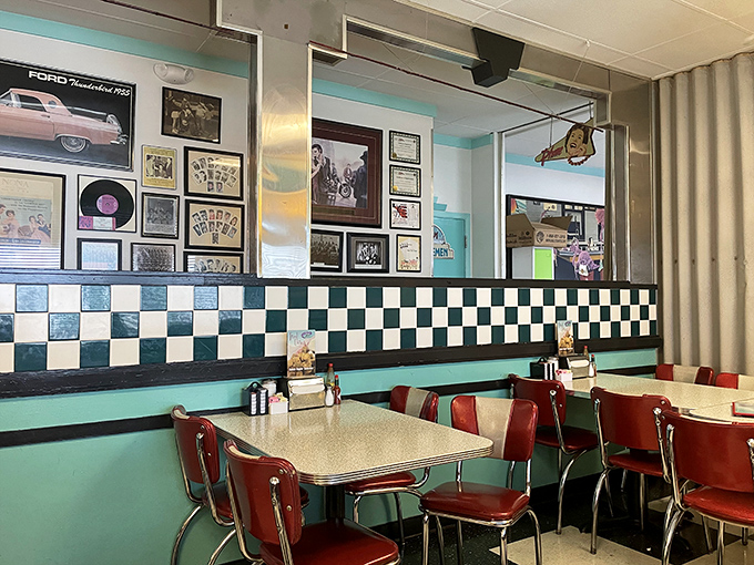 Classic Americana comes alive with turquoise walls, checkerboard tiles, and vinyl booths that have witnessed countless coffee refills and life stories.