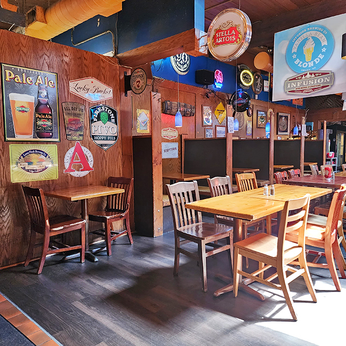 Beer signs illuminate wooden tables like a museum of hops and barley. This is where sandwich dreams and beer fantasies collide.