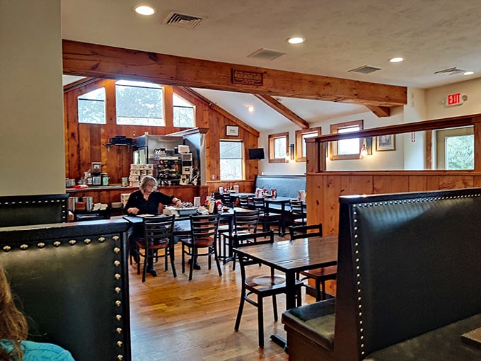 Warm wood paneling and exposed beams create that perfect diner ambiance&mdash;where conversations flow as freely as the coffee refills.