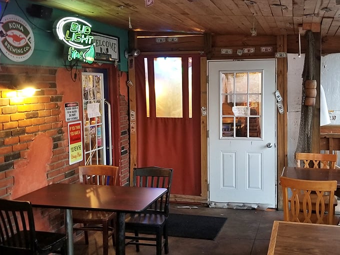 Exposed brick walls, wooden beams, and that glowing "Pub Light" sign&mdash;this is where comfort meets culinary magic in North Canton.