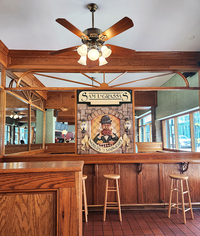 Warm wood paneling, vintage ceiling fans, and that iconic sandwich-loving gentleman in a bowler hat&mdash;this is what sandwich heaven's waiting room looks like.