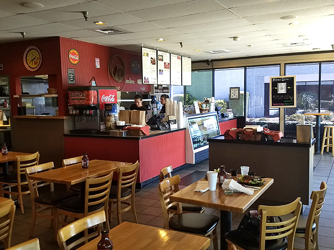 Step inside where red walls and wooden tables create the perfect backdrop for carnivorous adventures. 