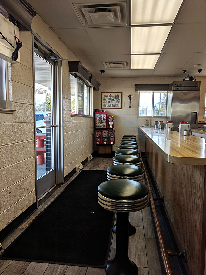Classic counter seating where strangers become friends over shared appreciation of honest food. These green vinyl stools have witnessed decades of satisfied sighs and sauce-stained smiles.