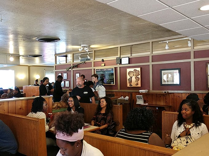 Inside, wooden booths and warm lighting create that perfect diner atmosphere where memories are made and pancake cravings are satisfied.