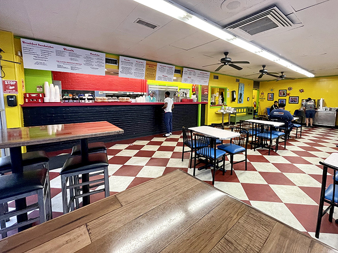 Step into a world where yellow walls capture morning sunshine and the checkerboard floor sets the stage for breakfast theater that's been playing to sold-out crowds for decades.