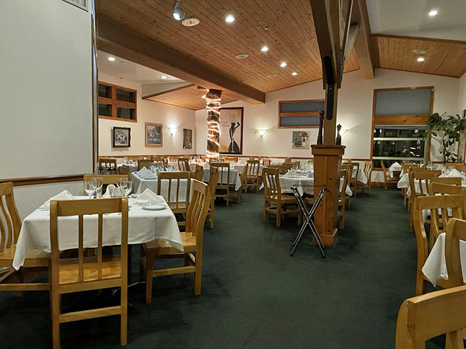 White tablecloths and wooden beams create that perfect "special occasion" atmosphere where memories are made between courses.